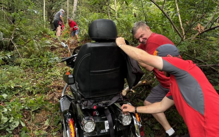 Woman using mobility scooter rescued after 10 metre fall off Lake ...